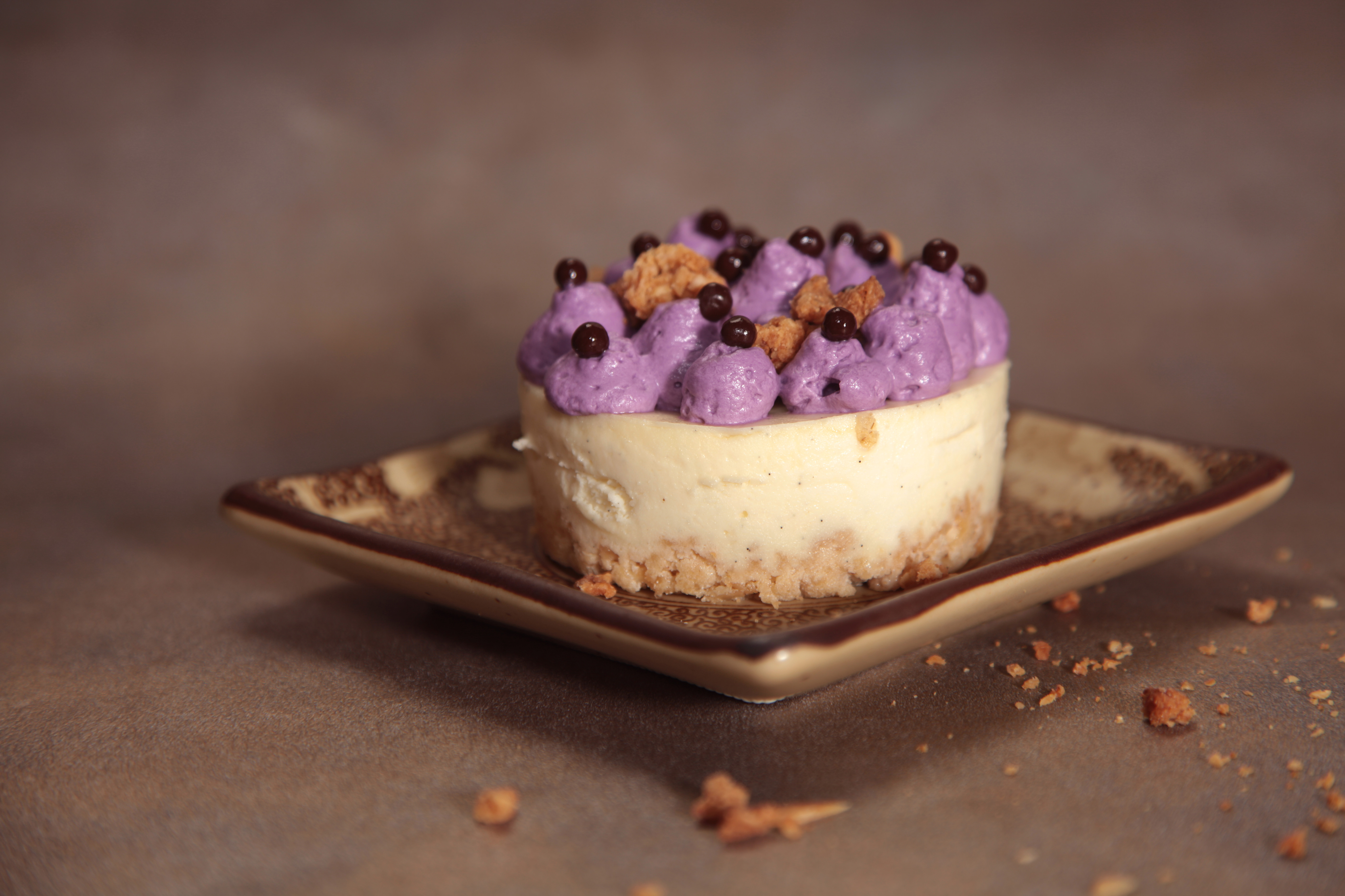 Vanilla Bean Cheesecake with Ube, Chocolate Pearls, & Granola - Sweet ...